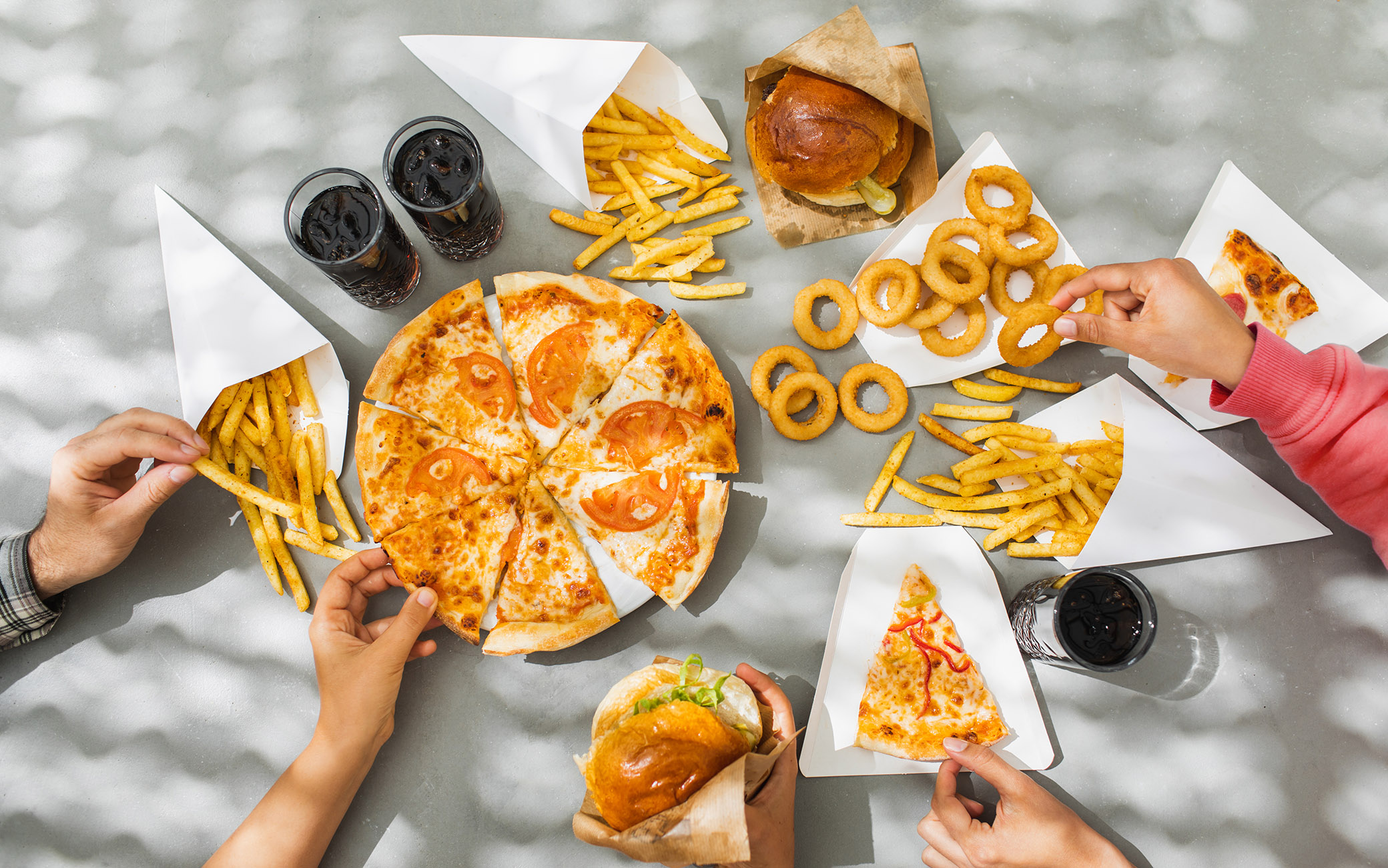 Salute, junk food altera l'area del cervello che controlla la fame. Lo ...
